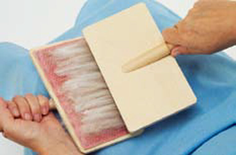 Six Steps to Hand Carding Wool – Mother Earth News